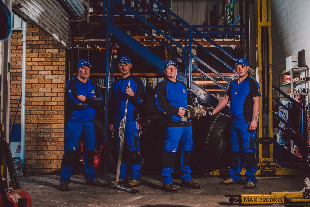 Durable automotive mechanic uniform for Modern Tyres employees